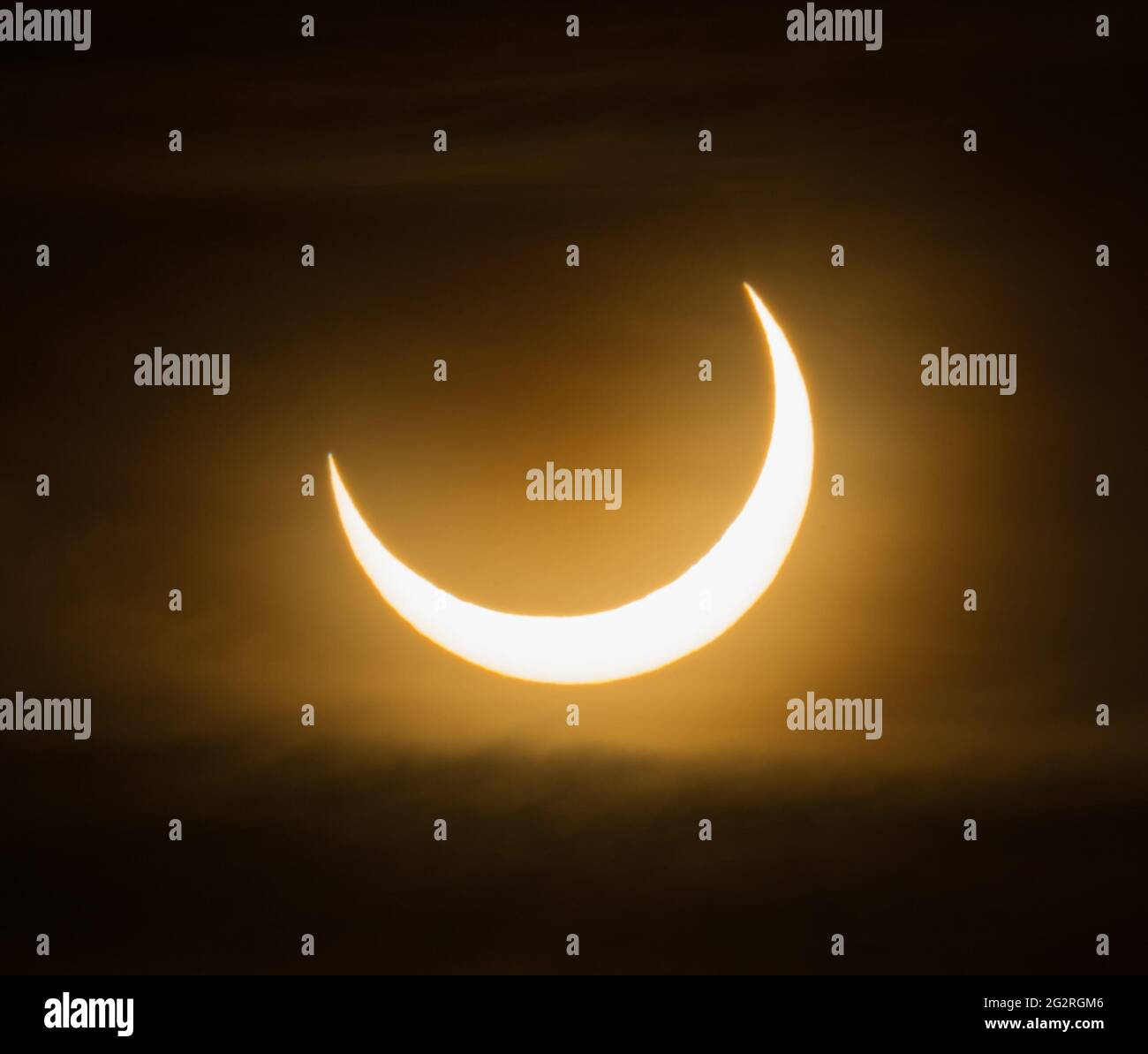 Annular eclipse over Montreal sky Stock Photo - Alamy