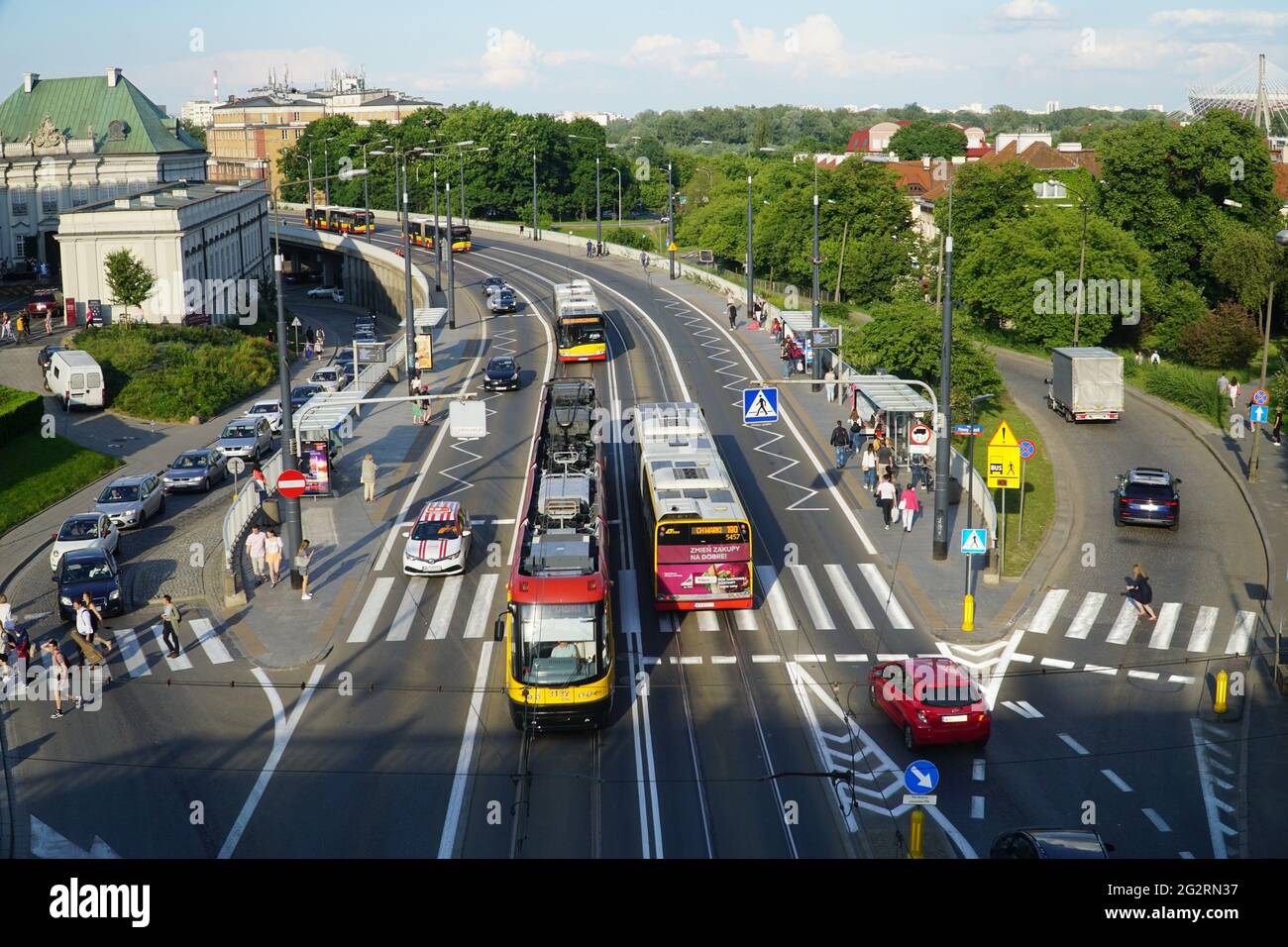 Warsaw public transport in the city centre at Old City stop. Buses and ...