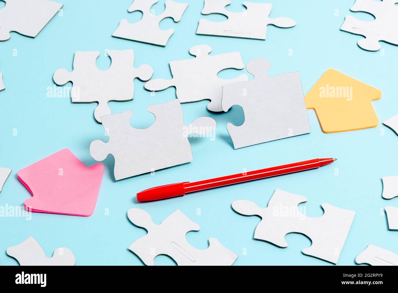 Building An Unfinished White Jigsaw Pattern Puzzle With Missing Last ...