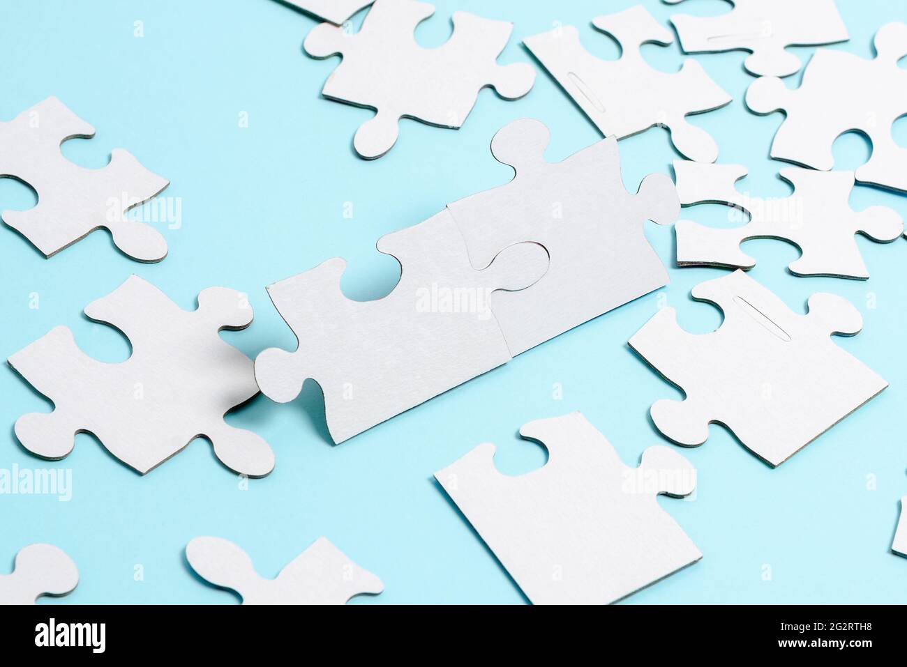 Building An Unfinished White Jigsaw Pattern Puzzle With Missing Last ...