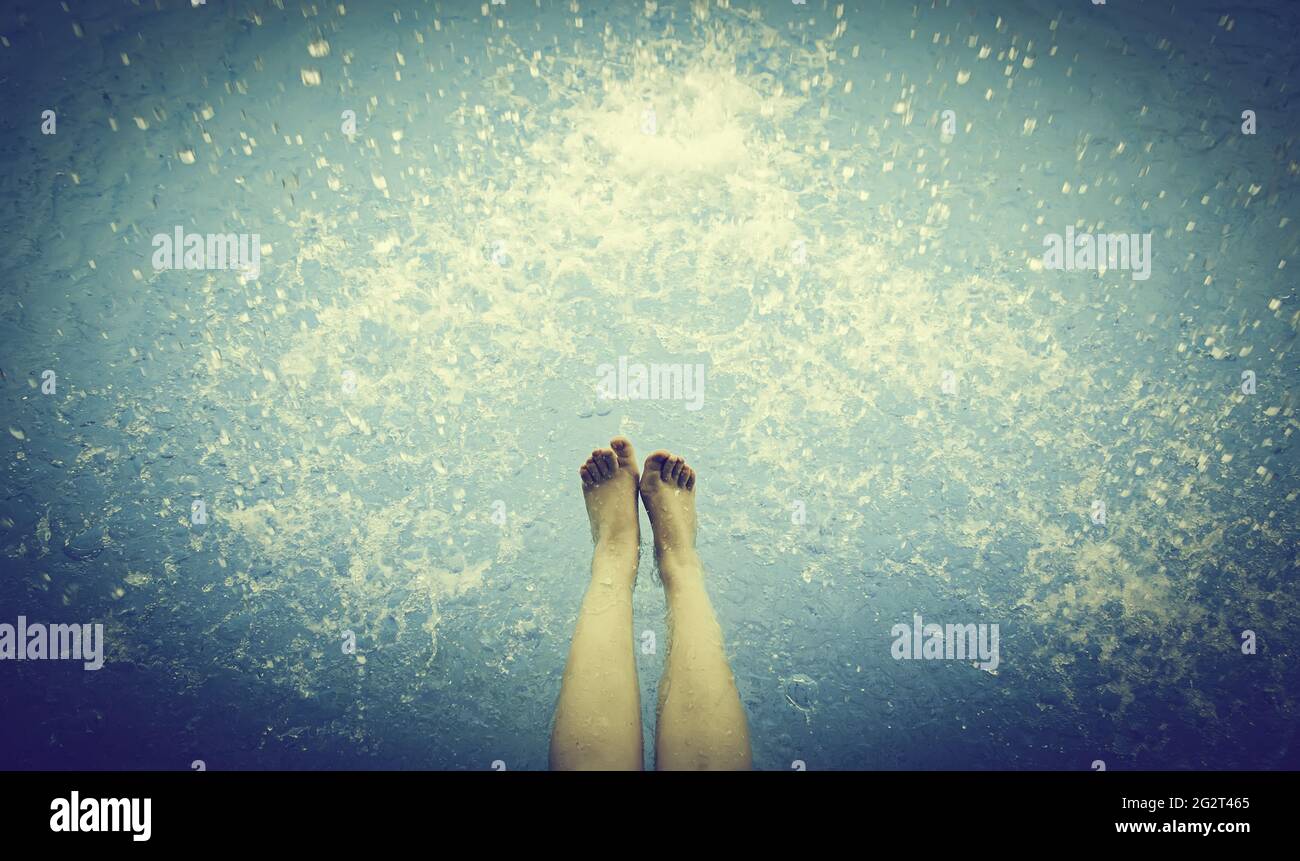Feet in pool playing with water, summer and sport Stock Photo - Alamy