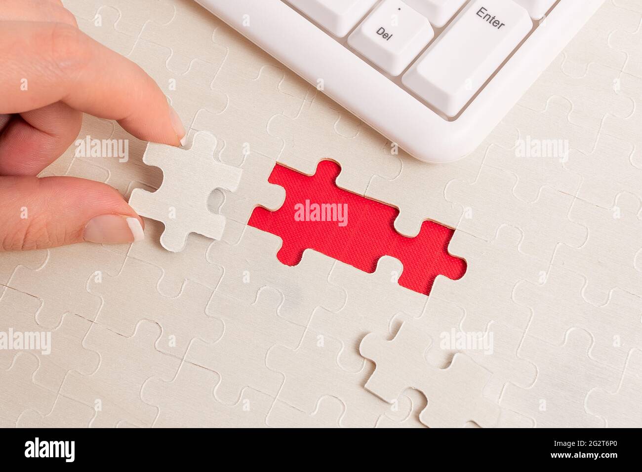 Building An Unfinished White Jigsaw Pattern Puzzle With Missing Last ...