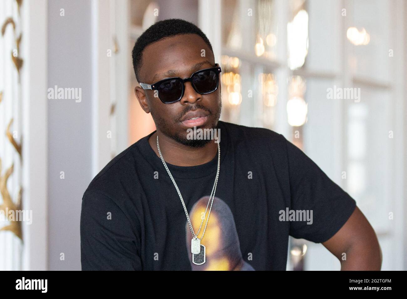DADJU posing for a photo session as part of the 35th Cabourg Film ...