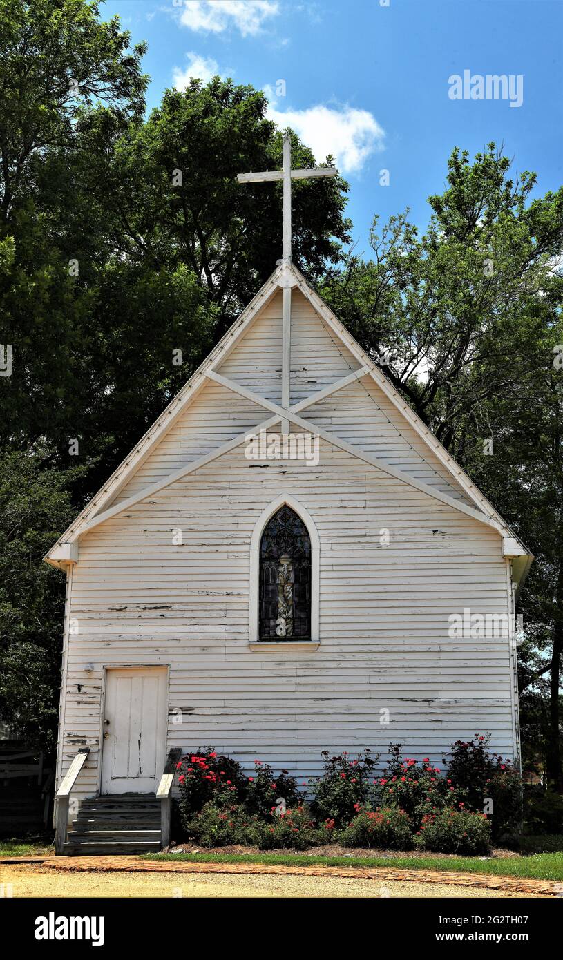 The hot summer sun peels the paint on the old country church Stock ...
