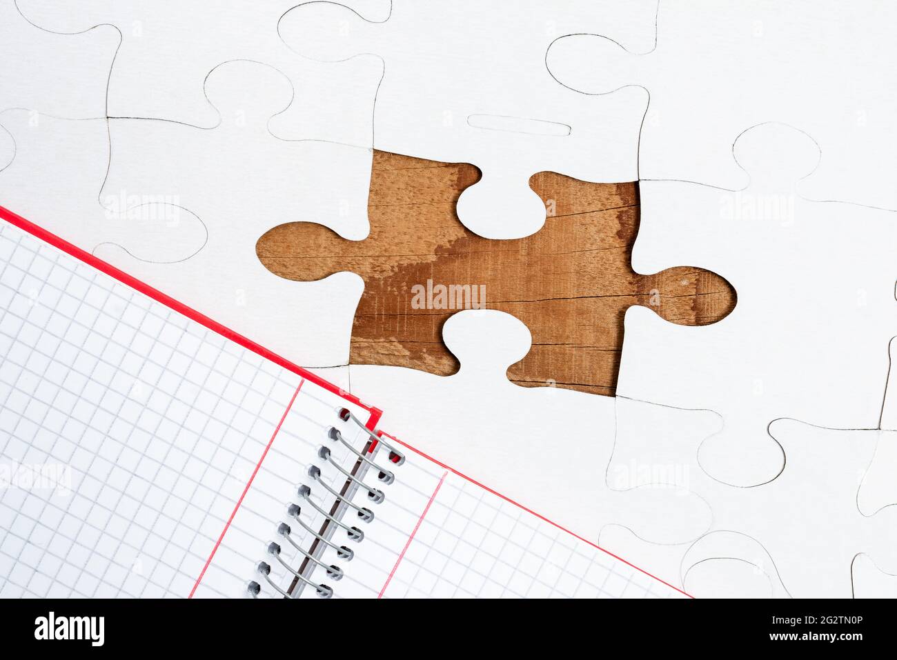 Building An Unfinished White Jigsaw Pattern Puzzle With Missing Last ...