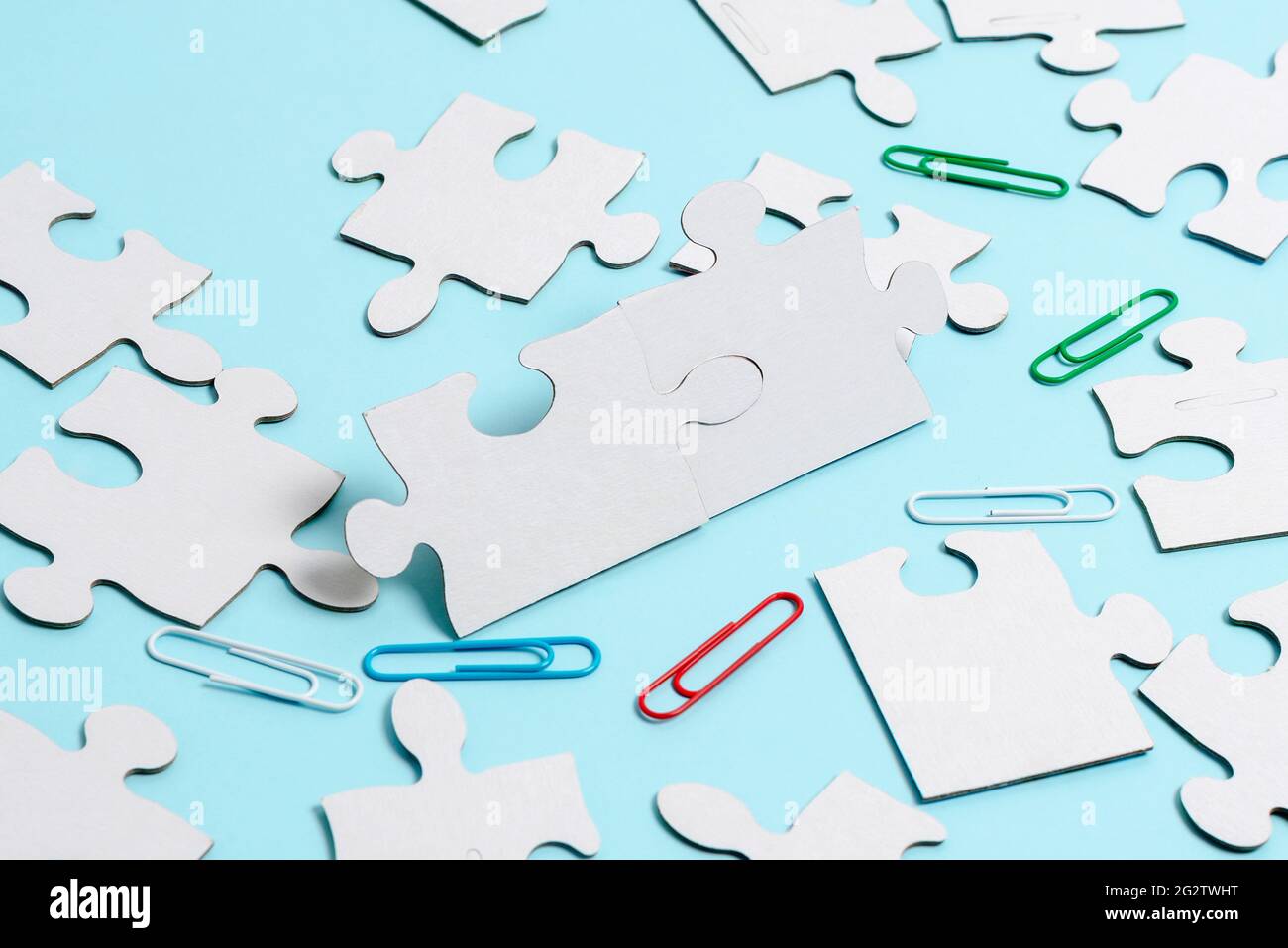 Building An Unfinished White Jigsaw Pattern Puzzle With Missing Last ...