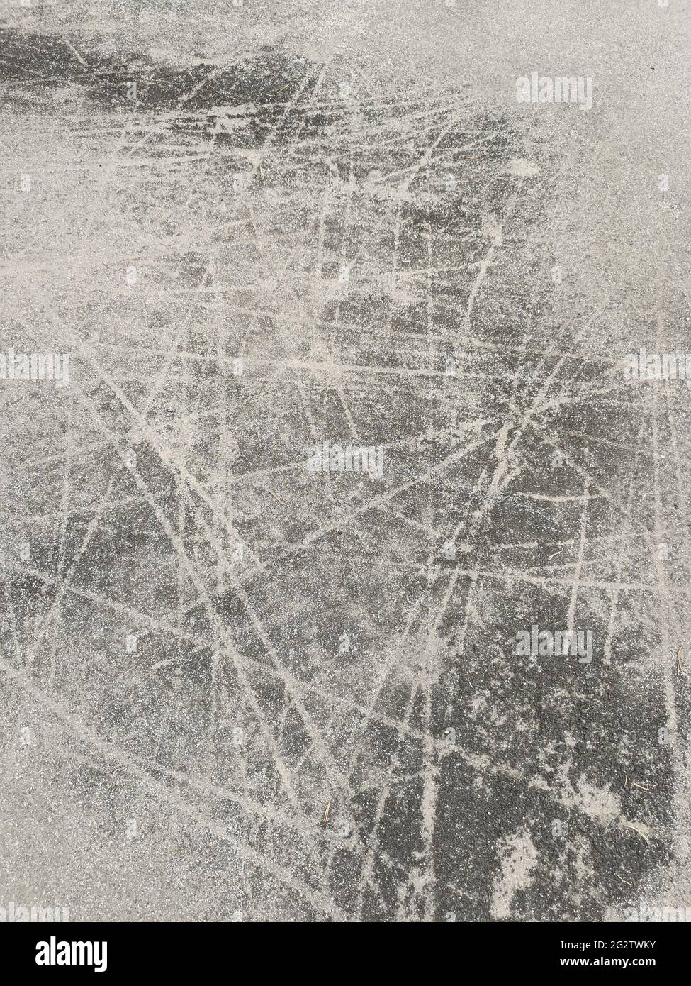 A vertical illustration of a grey faded and scratched up surface ...