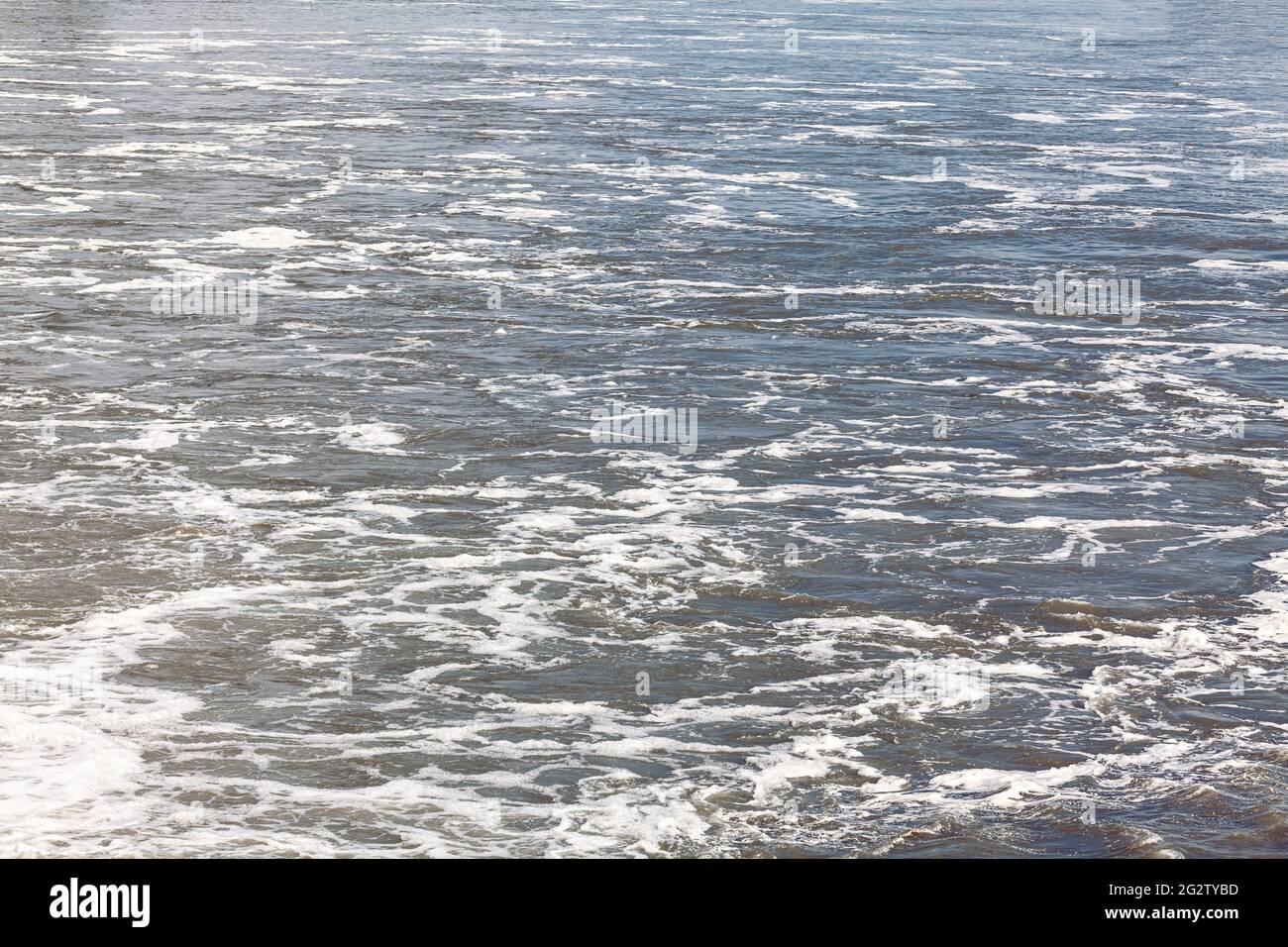 Flowing water surface . Moving water with waves pattern Stock Photo - Alamy