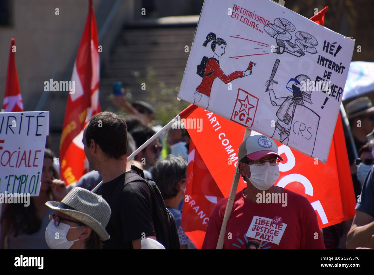 A protester holding a placard expressing his opinion, during the march ...