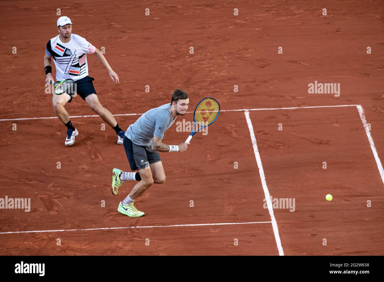 Paris, France. 12th June, 2021. Alexander Bublik (R) and Andrey Golubev ...