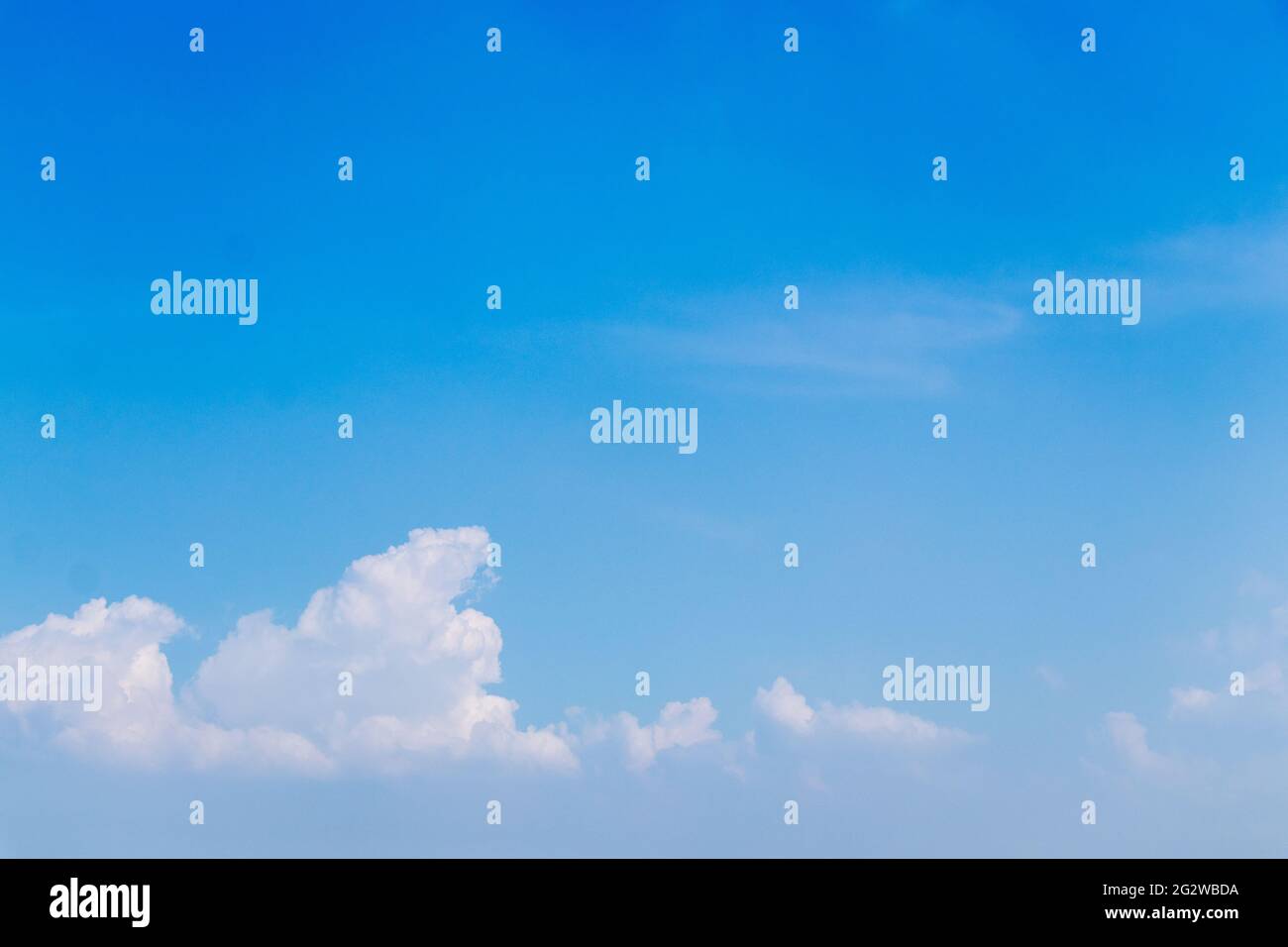 Clear blue color sky with white cloud background Stock Photo - Alamy