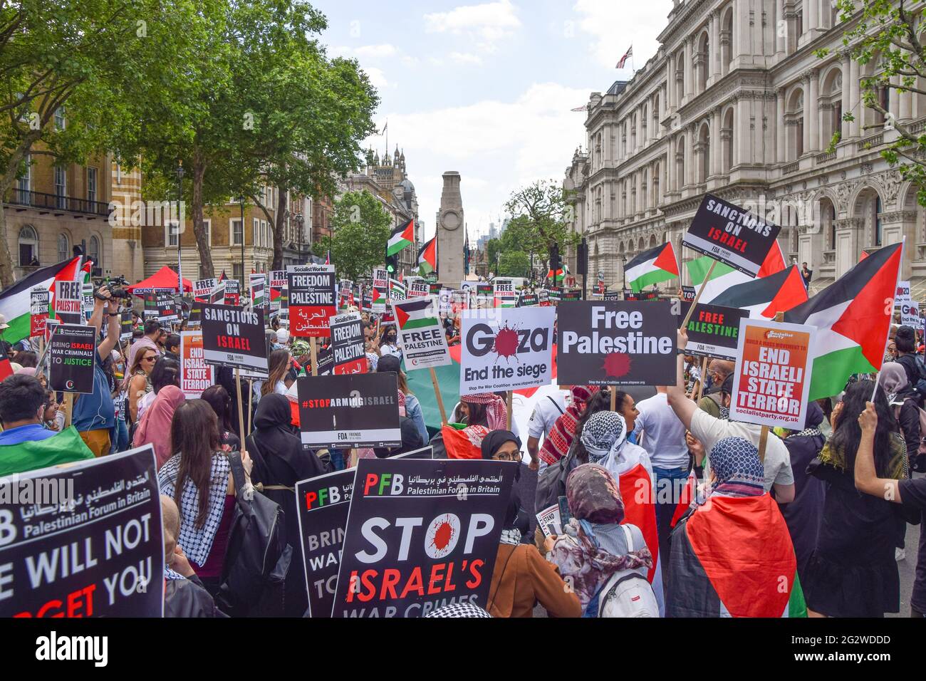 Protesters with flags and placards gather outside Downing Street during ...