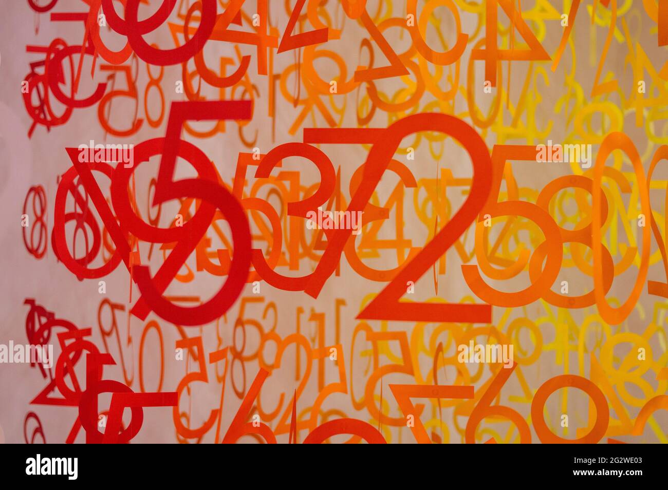 Pattern of numbers hanged and colored red orange and yellow Stock Photo ...