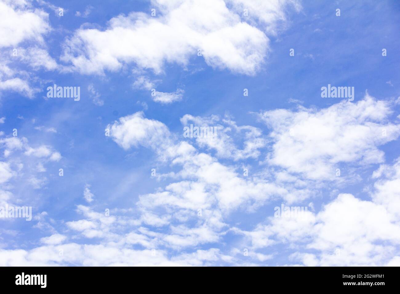 Clear blue color sky with white cloud background Stock Photo - Alamy