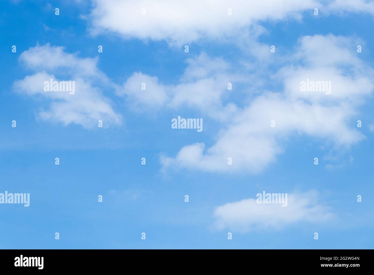 Clear blue color sky with white cloud background Stock Photo - Alamy