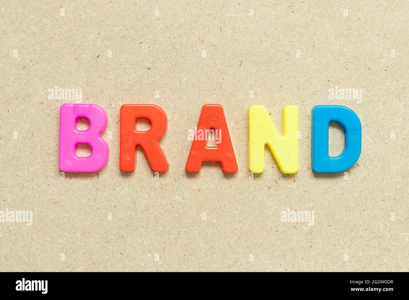 Color alphabet letter with word brand on wood background Stock Photo ...