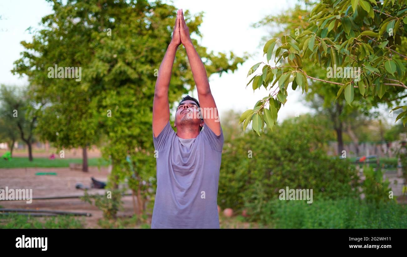 Morning sunrise, Namaste Lotus pose. Meditation and Relax. Indian man ...