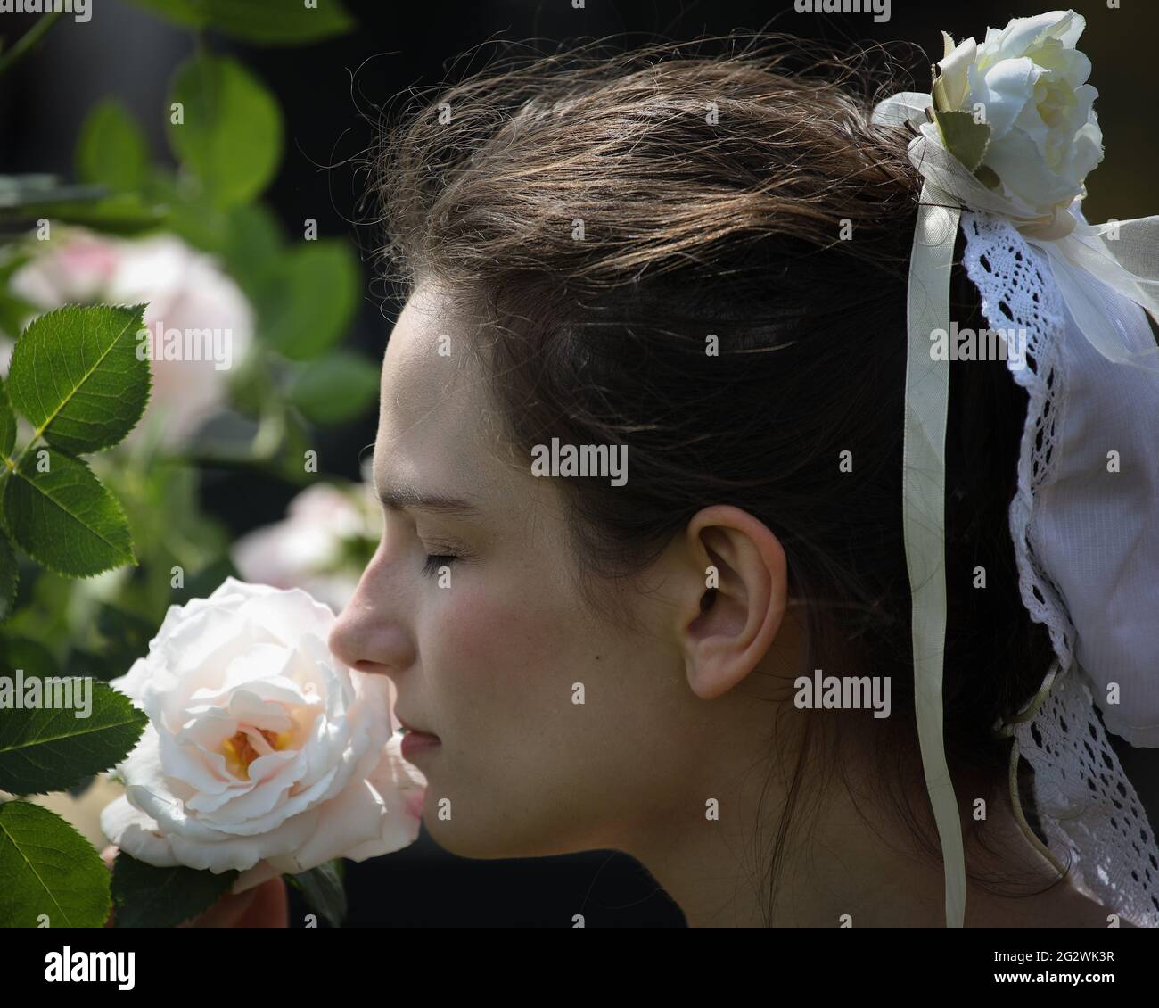 Warsaw, Poland. 12th June, 2021. A woman smells a "Queen of Warsaw ...