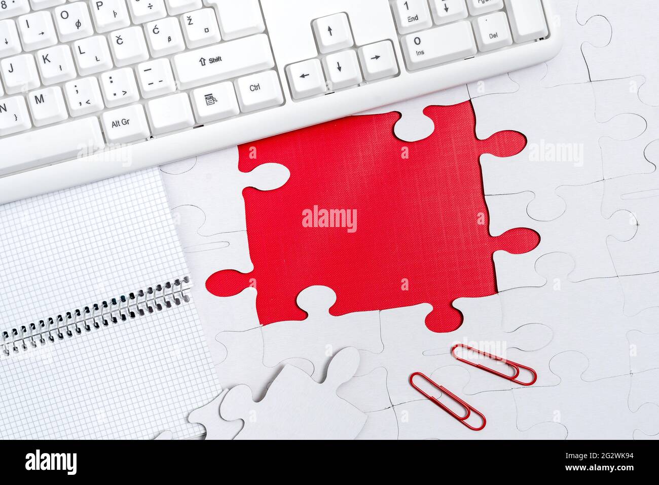 Building An Unfinished White Jigsaw Pattern Puzzle With Missing Last ...