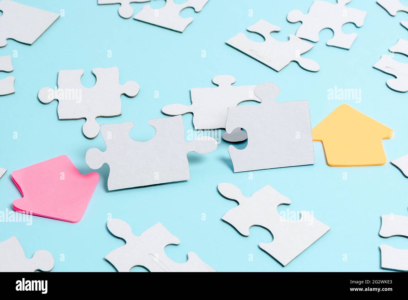 Building An Unfinished White Jigsaw Pattern Puzzle With Missing Last ...
