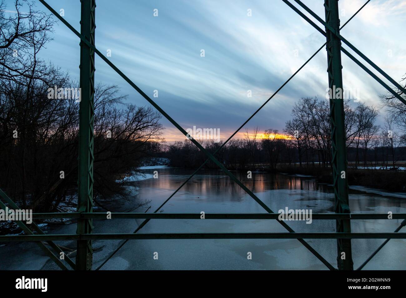 The frigid St. Joseph River can be seen through the trusses an old ...