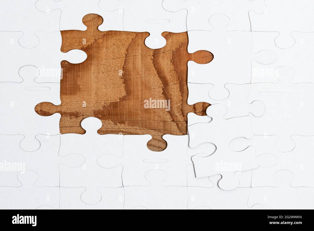 Building An Unfinished White Jigsaw Pattern Puzzle With Missing Last ...