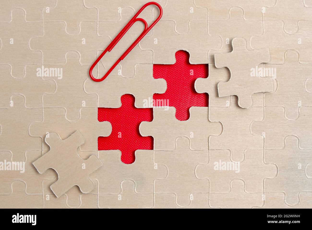 Building An Unfinished White Jigsaw Pattern Puzzle With Missing Last ...