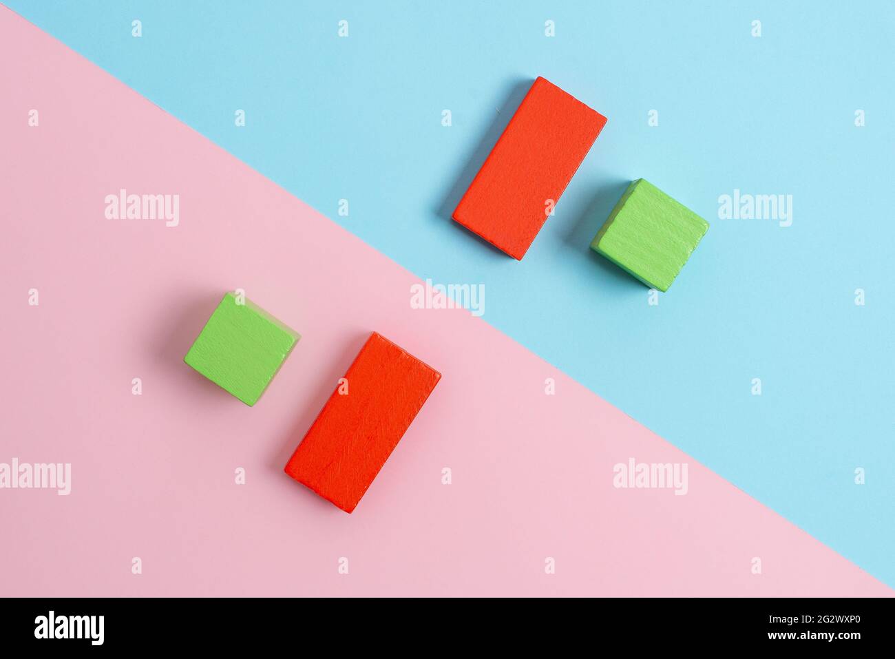 Two Objects Arranged Facing Inward Outward On a Separated Coloured ...