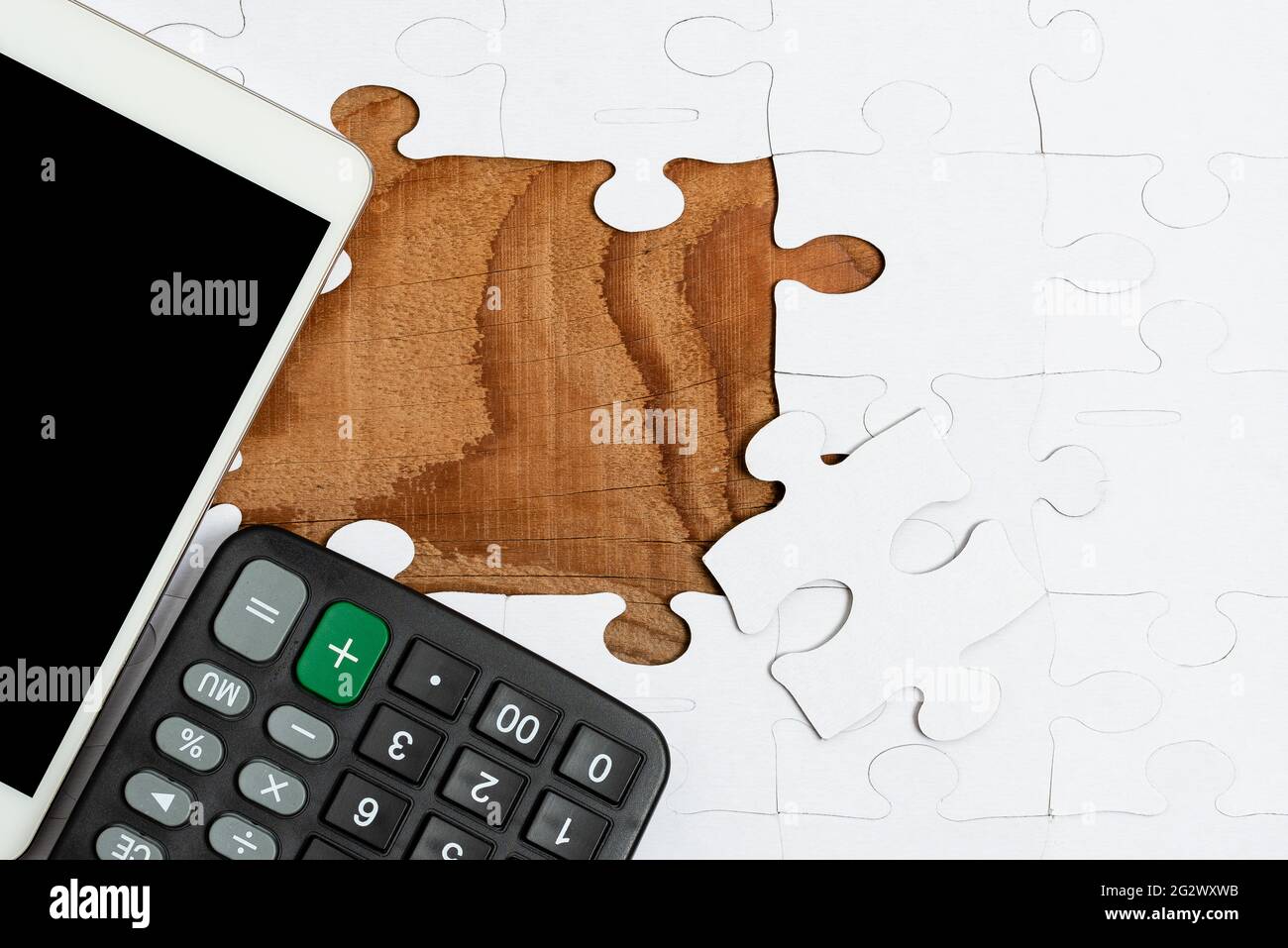 Building An Unfinished White Jigsaw Pattern Puzzle With Missing Last ...