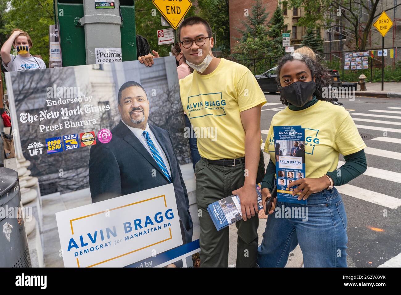 Alvin Bragg campaign works hand out cards to voters outside a polling ...