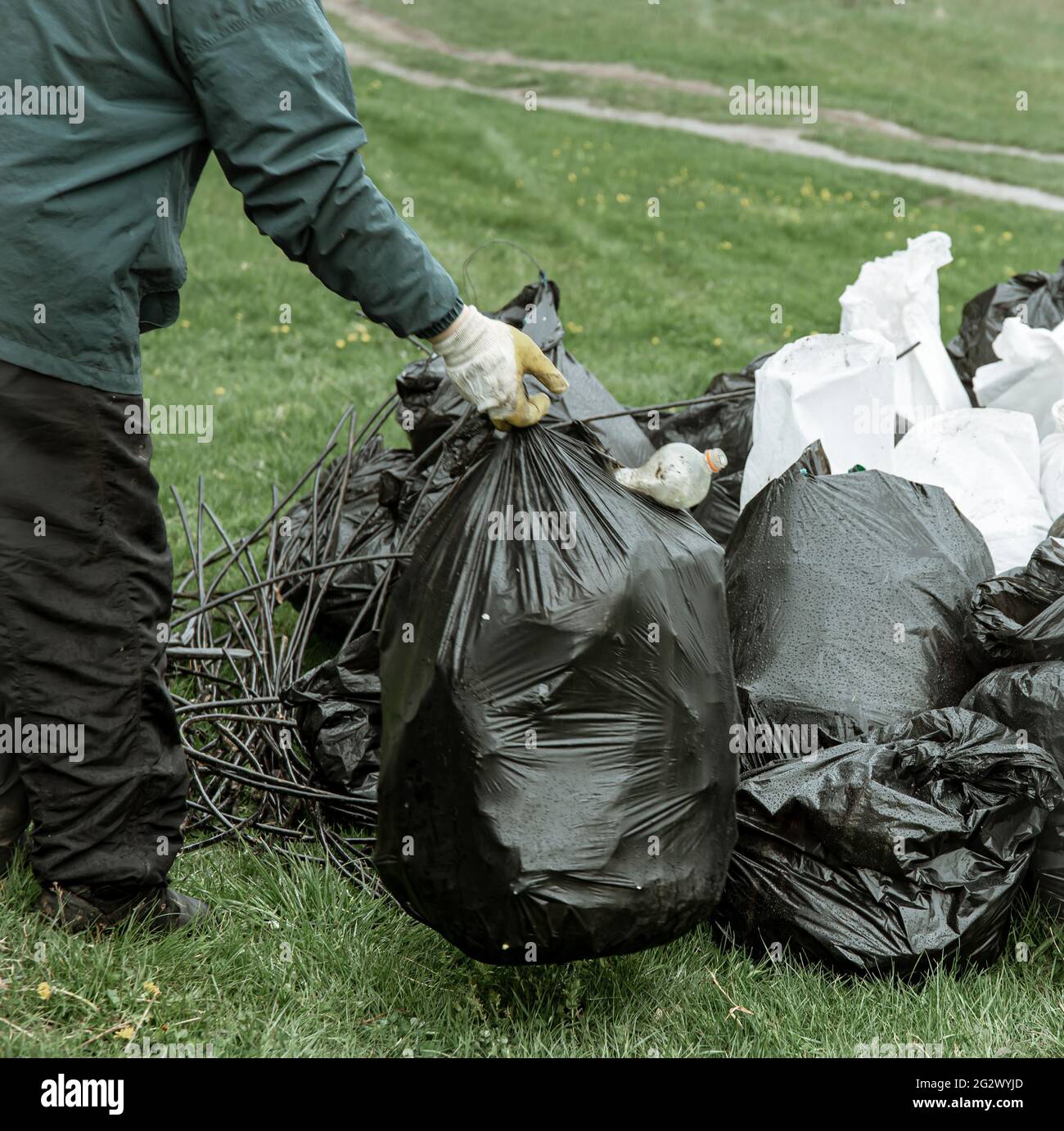 Close up of trash bags filled with trash after cleaning the environment ...