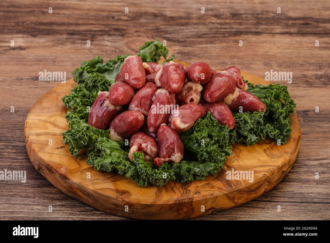 Raw chicken hearts heap for cooking Stock Photo - Alamy