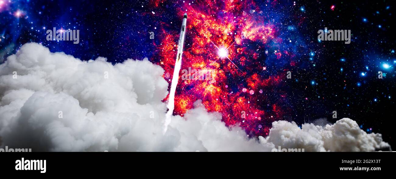 Rockets launch into space on the starry sky. Rocket starts into space ...