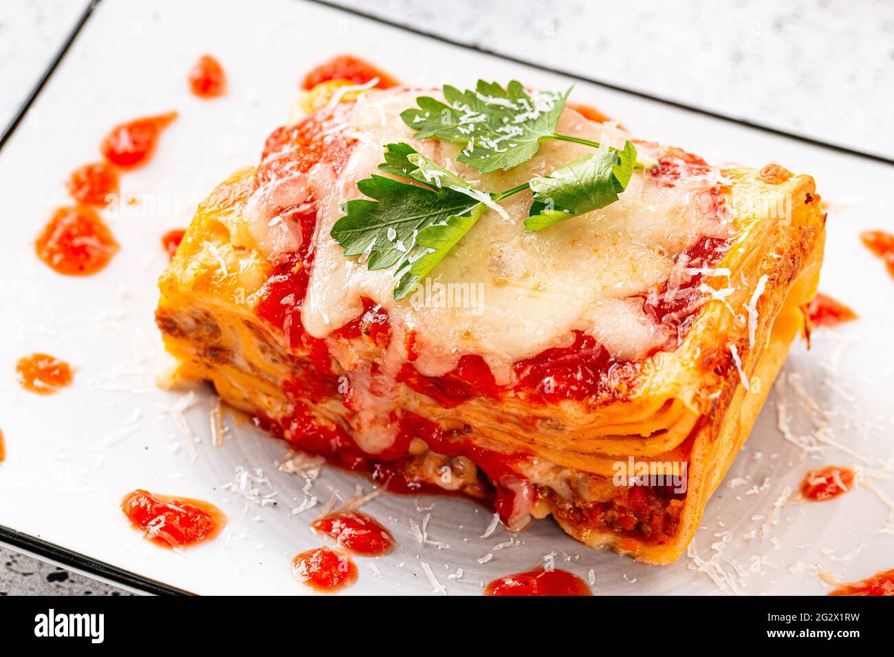 Side view on italian lasagna dish Stock Photo - Alamy