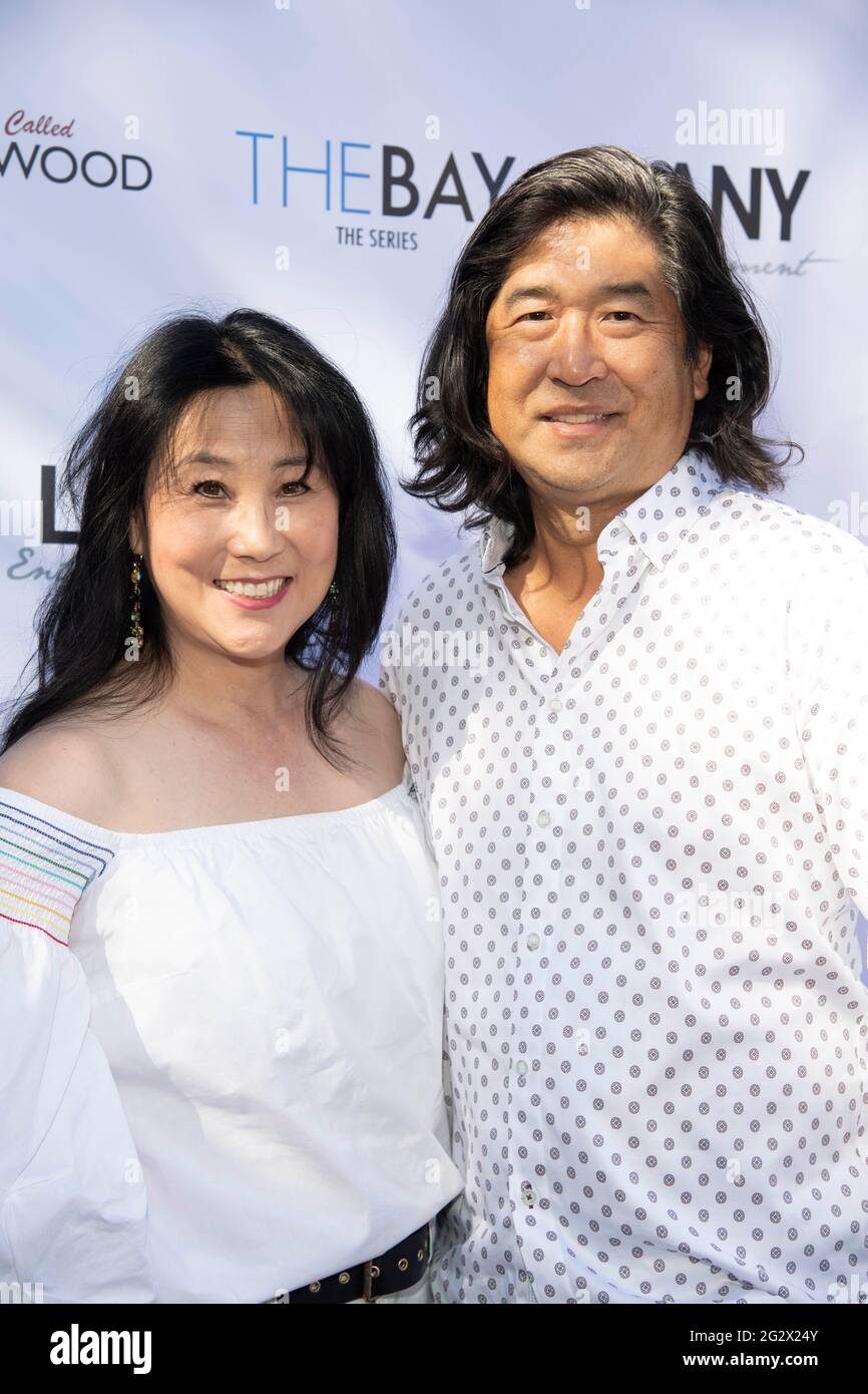 Los Angeles, USA. 12th June, 2021. Michelle Kim, John Kim attend LANY ...