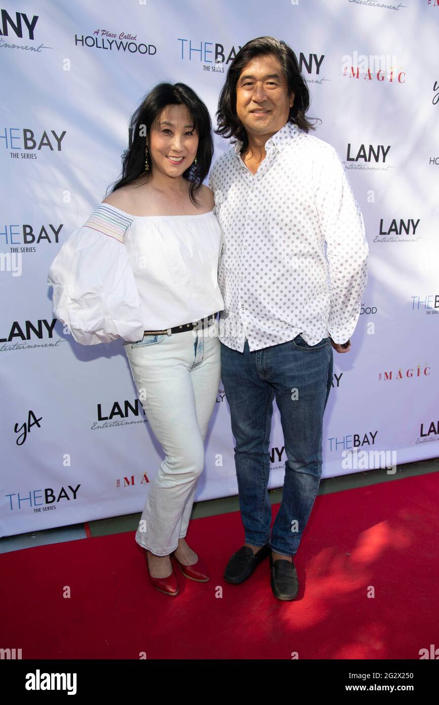 Los Angeles, USA. 12th June, 2021. Michelle Kim, John Kim attend LANY ...