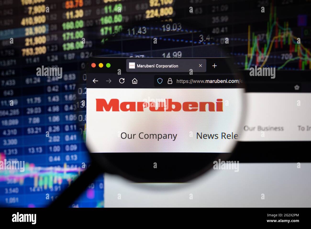Marubeni company logo on a website with blurry stock market ...