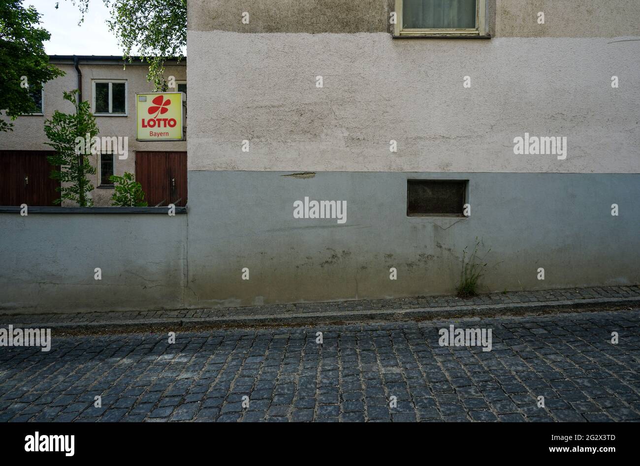 View from the street in Altomünster, Bavaria, of a LOTTO Bayern neon ...