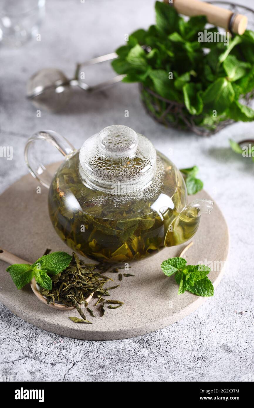 green mint tea in a teapot Stock Photo - Alamy
