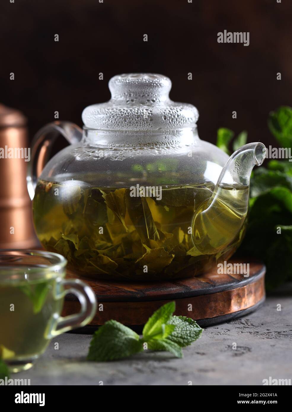 green mint tea in a teapot Stock Photo - Alamy