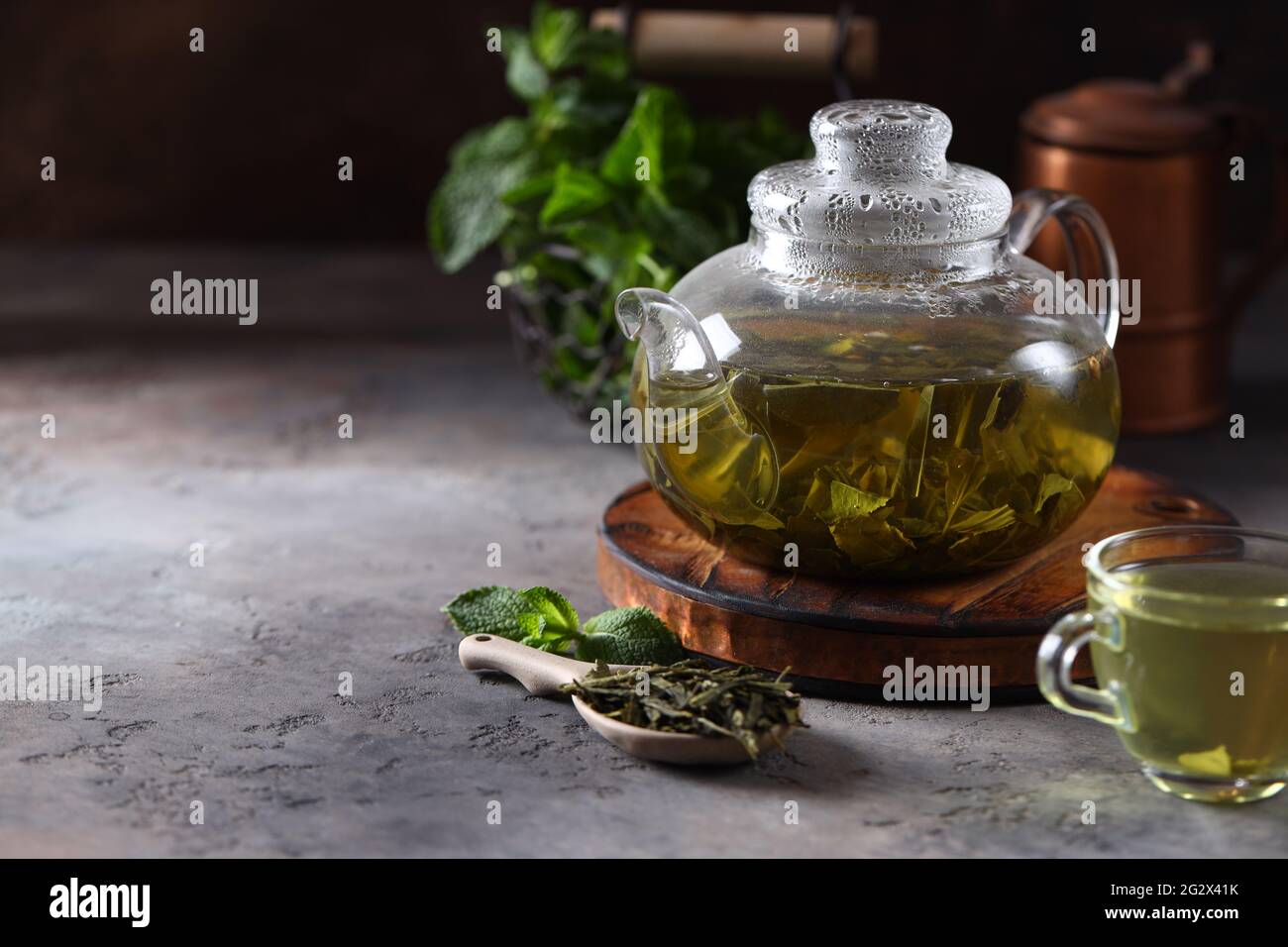 green mint tea in a teapot Stock Photo - Alamy