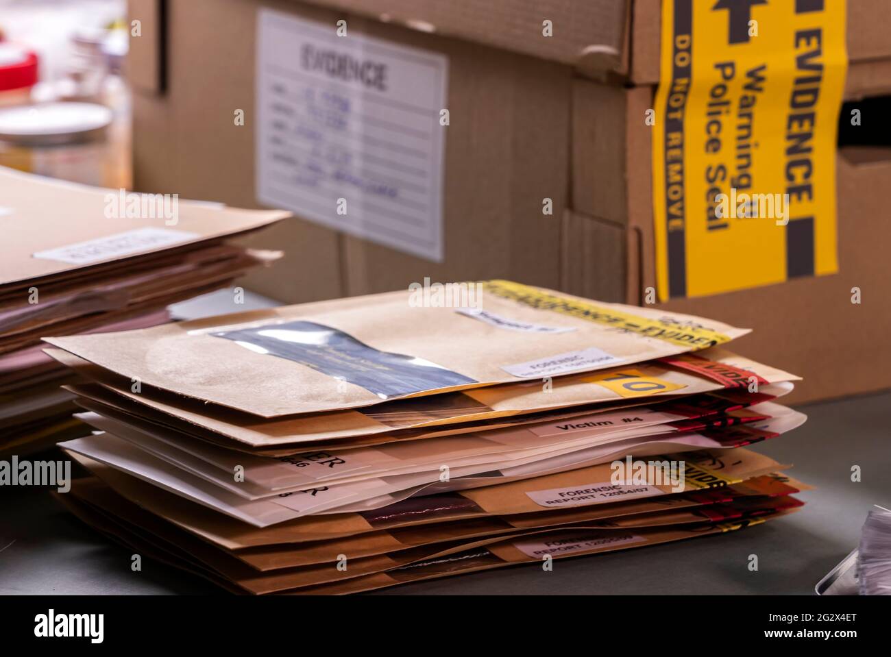 Files and evidence bag in a crime lab, conceptual image Stock Photo - Alamy