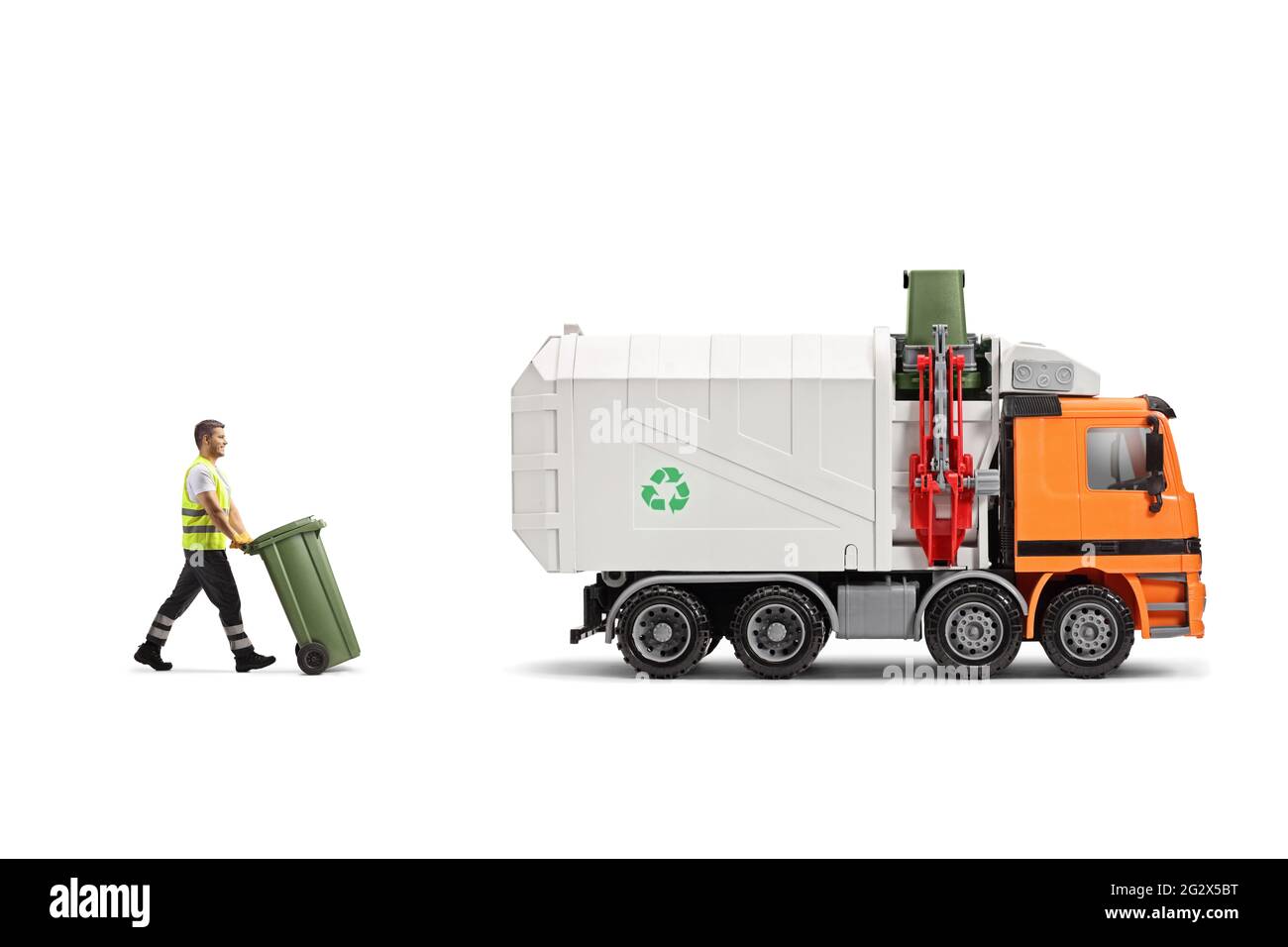 Full length profile shot of a waste collector pushing a bin towards a ...