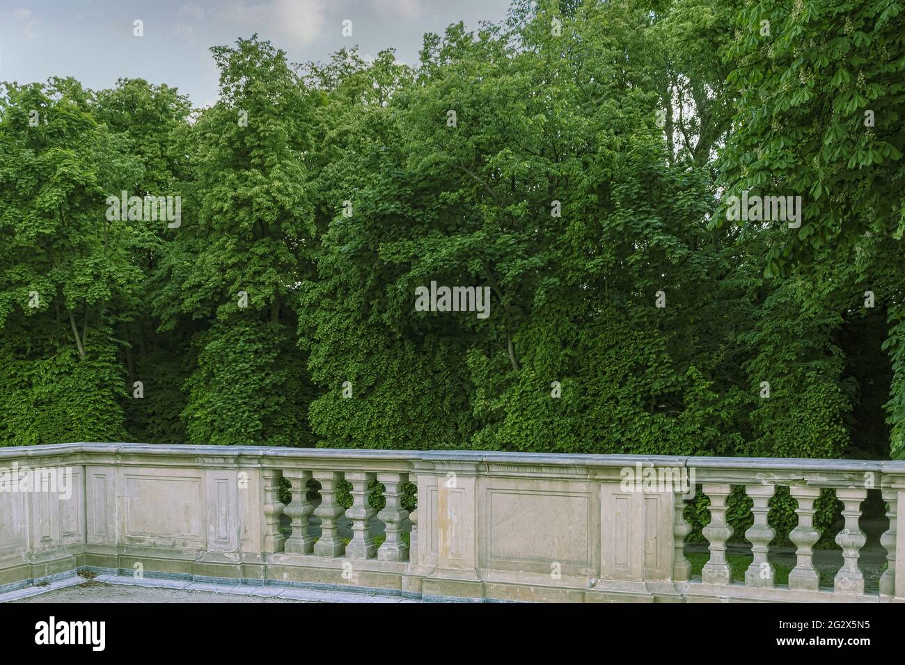 Vintage balcony of the old castle overlooking the garden. Terrace with ...