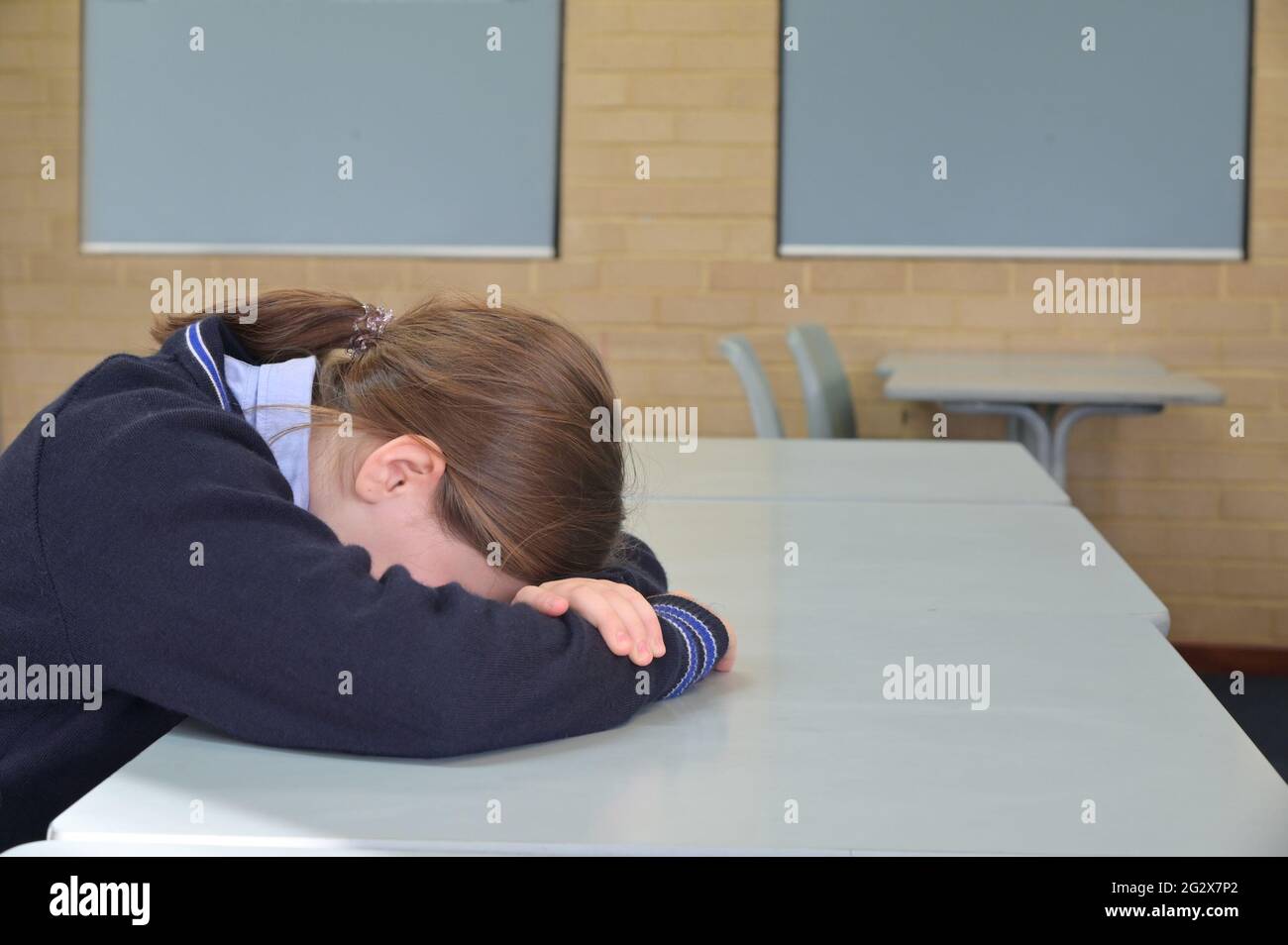 Sad Girl Sitting In Classroom High Resolution Stock Photography and ...