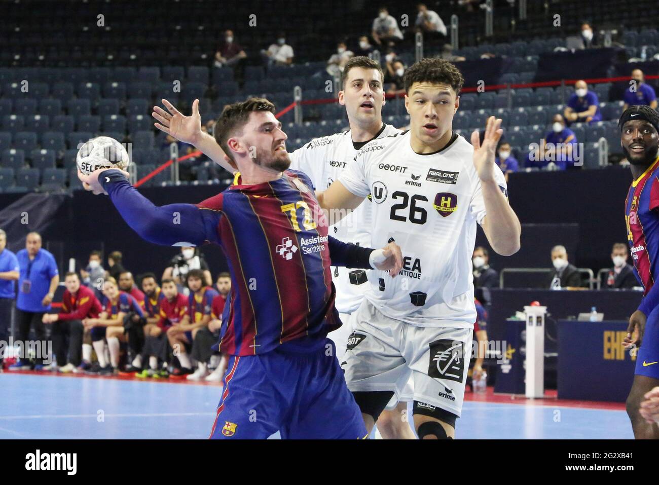 Ludovic Fabregas of FC Barcelona, Theo Monar of HBC Nantes during the ...
