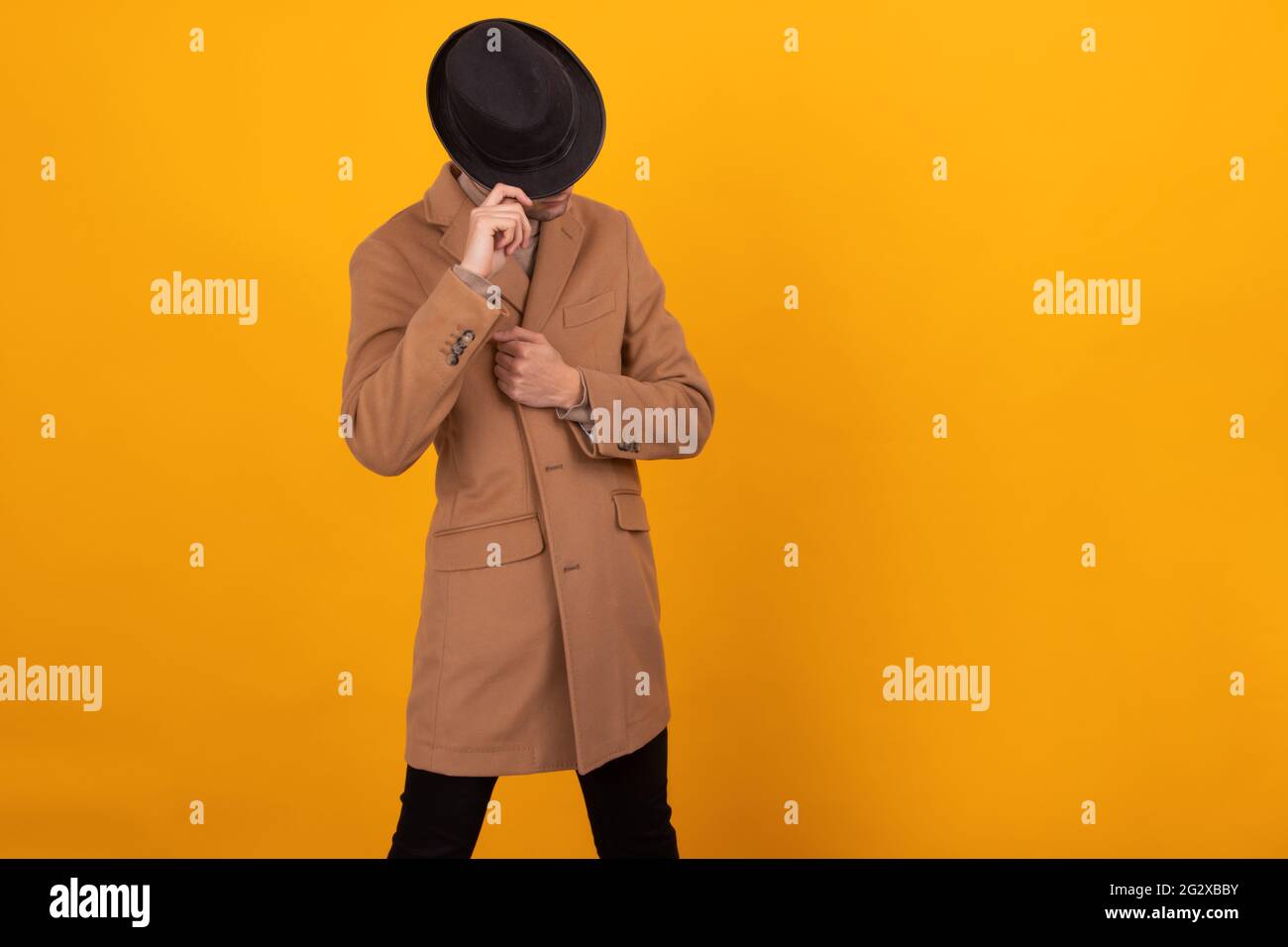 Business man in hat coat hi-res stock photography and images - Alamy