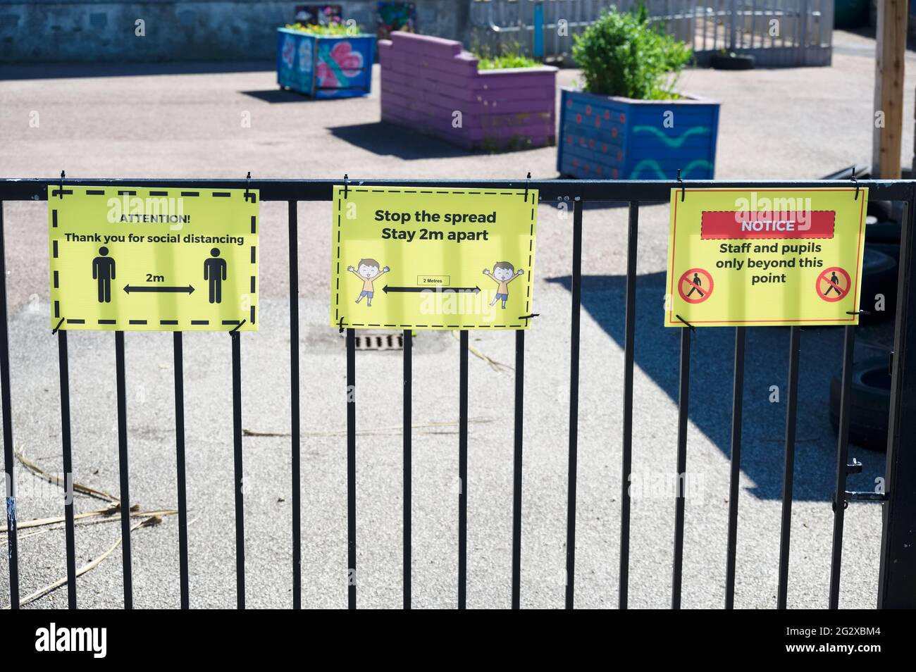 Social distancing sign at school playground road crossing Stock Photo ...