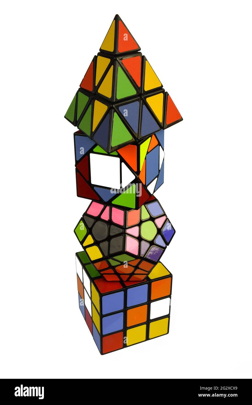 4 different cubes arranged vertically on top of each other Stock Photo ...