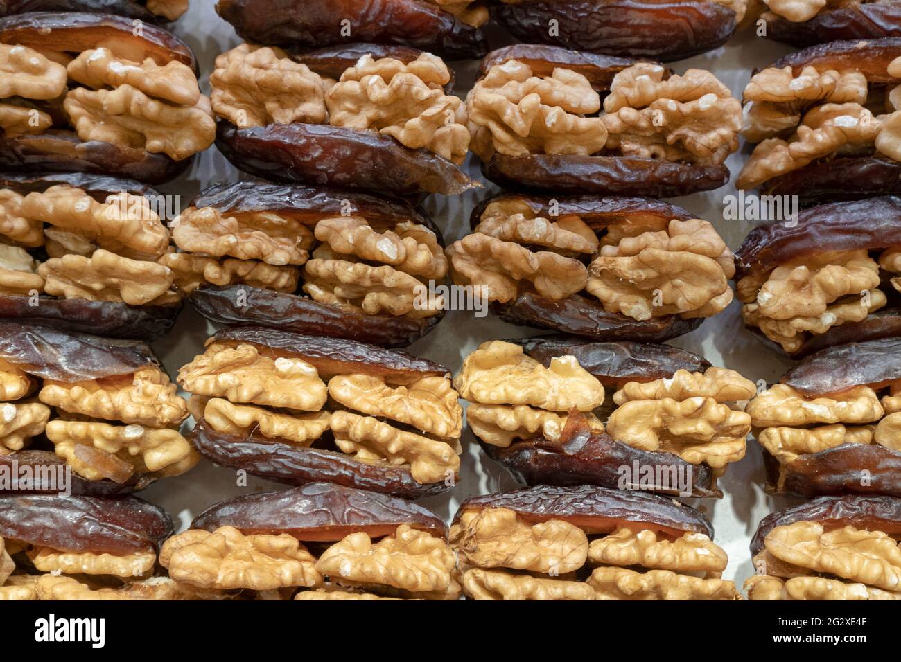 Dessert dates stuffed with nuts. Top view blur textures soft focus ...